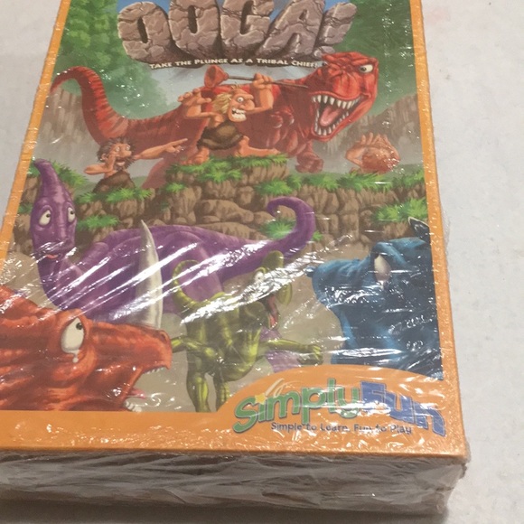 Simply Fun | Toys | Ooga Dinosaur Feeding Game Take A Plunge As A ...